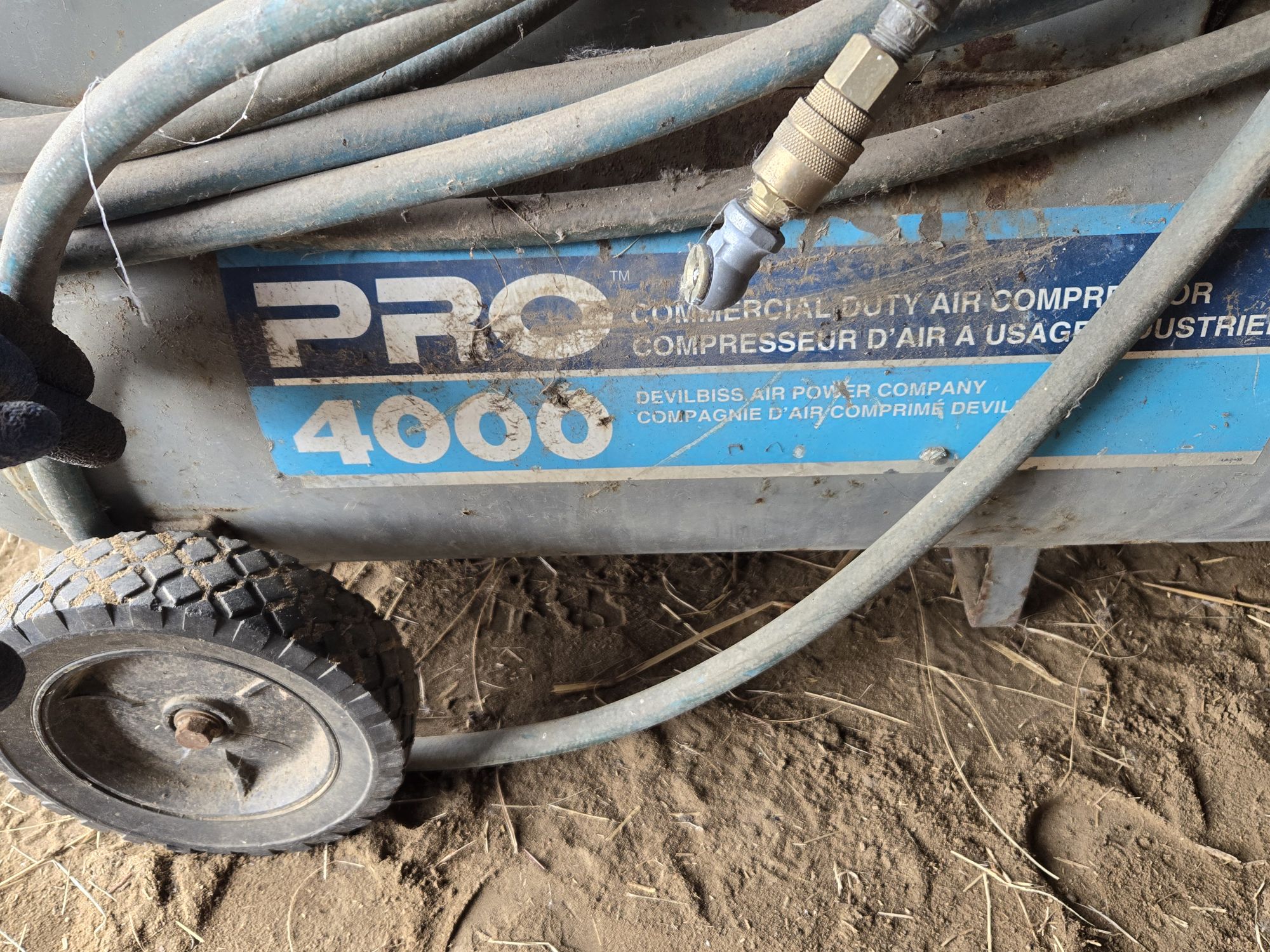 Pro 4000 air compressor - Wild Country Auctions Inc